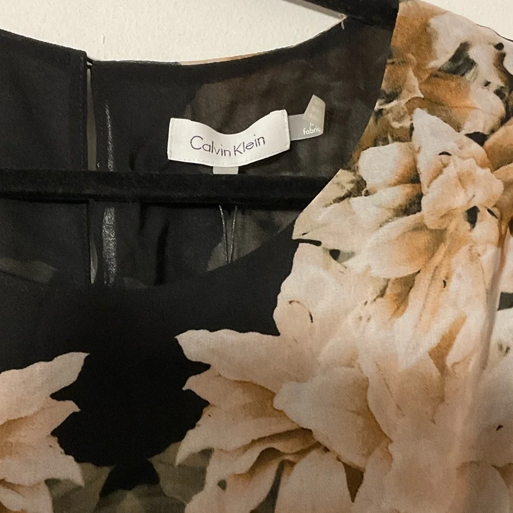 Calvin Klein | Tops | Calvin Klein Black Blouse With Cream Floral Print ...